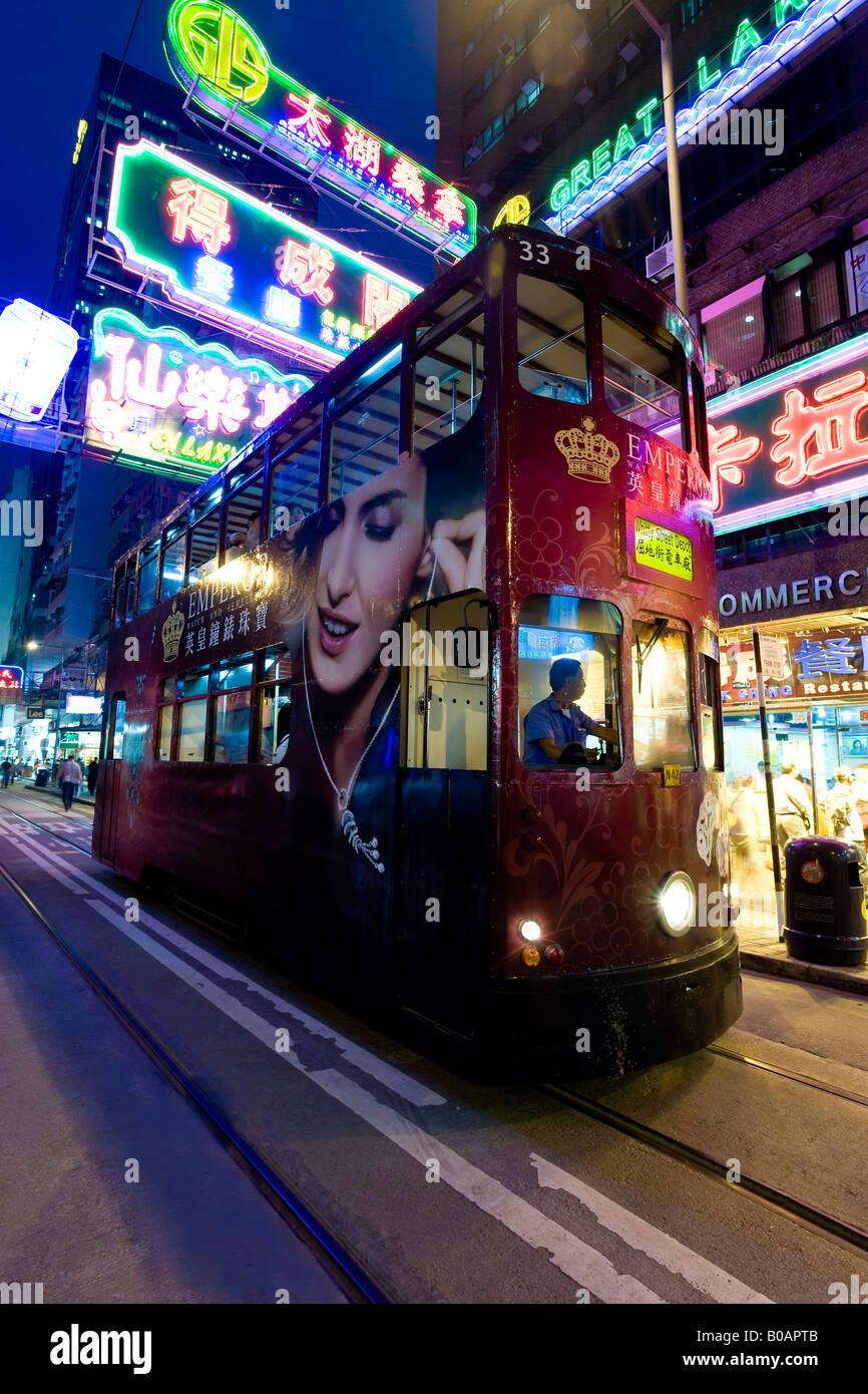 China, Hong Kong, Hong Kong Island, Wan Chai, brightly coloured trams ...