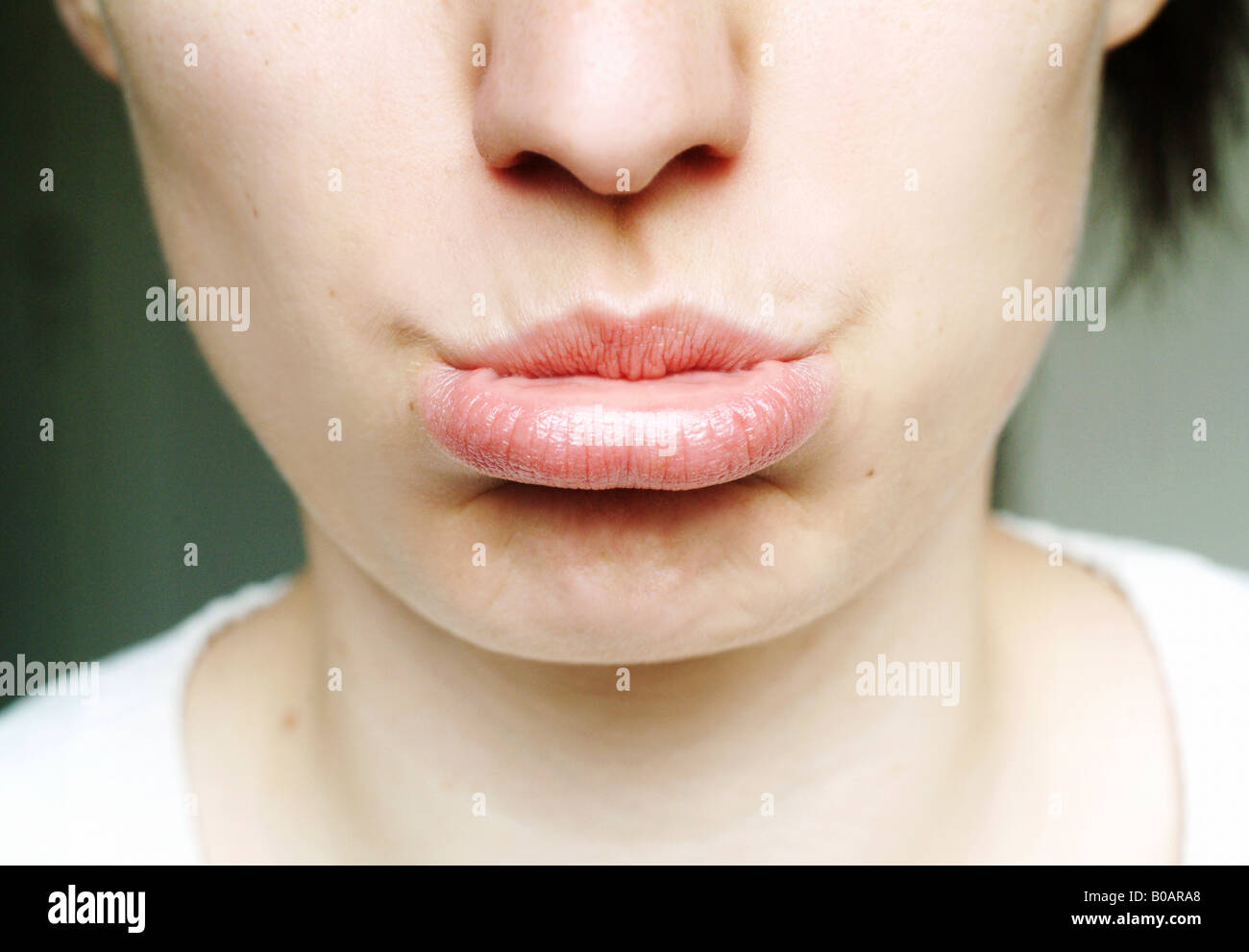 A woman pouting Stock Photo - Alamy
