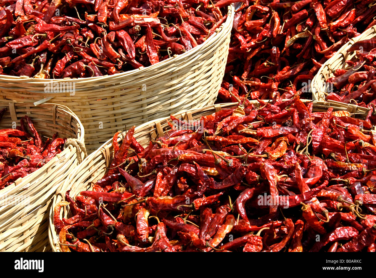 Baskets of chilies at the Thimphu Weekend Market, Bhutan Stock Photo ...