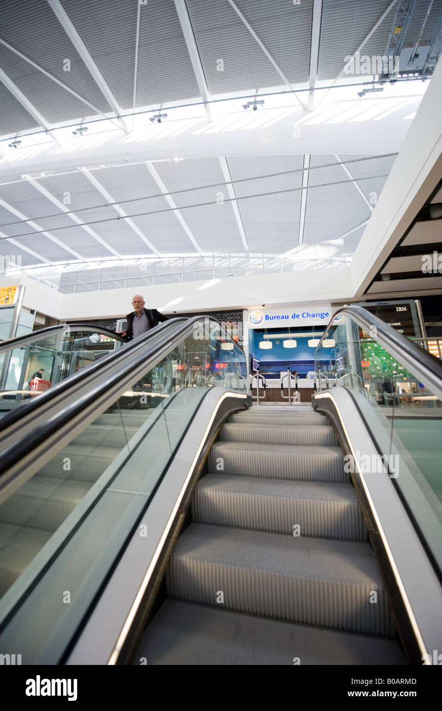 escalators at terminal five Heathrow airport London Stock Photo - Alamy