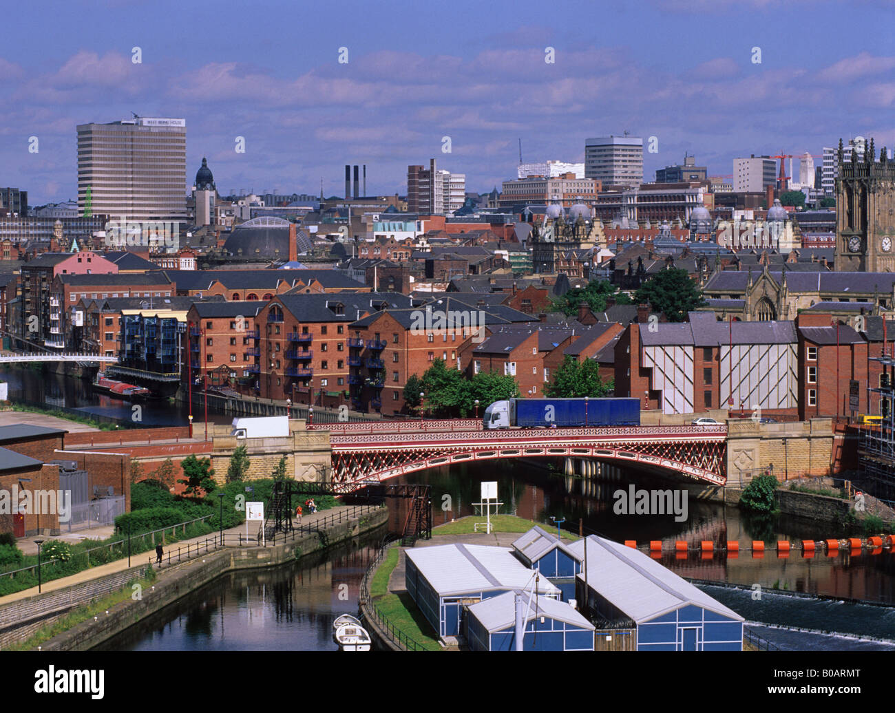 traffic crossing bridge over the River Aire in the city of Leeds ...