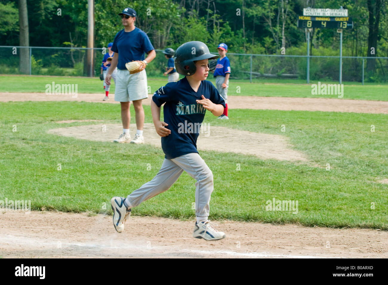 Little league baseball players in hi-res stock photography and images ...