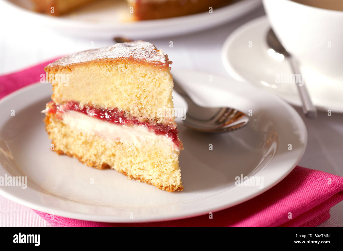 Slice of Victoria Sponge Cake Stock Photo - Alamy