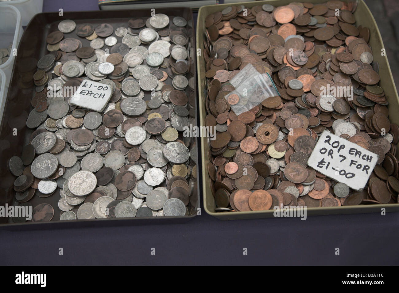 Old coins on sale on market stall Stock Photo - Alamy