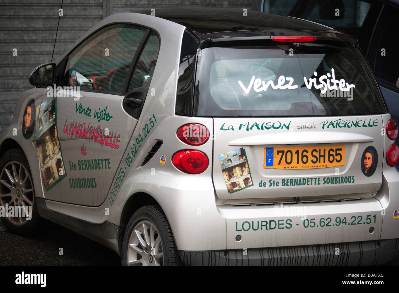 europe southwest france haute pyrénées lourdes a smart car covered in ...