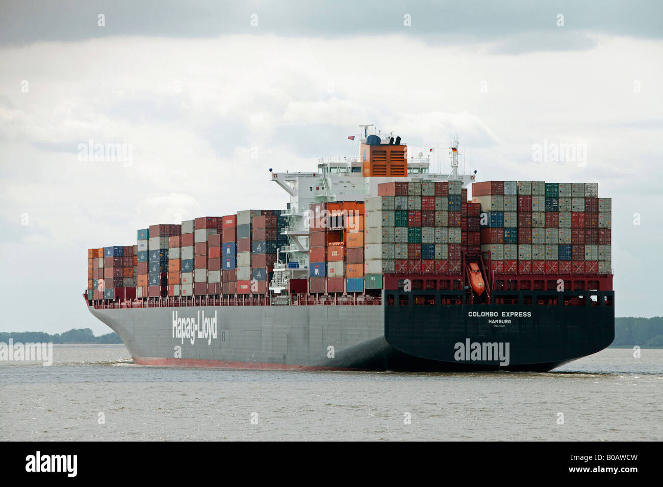 A container ship on the Elbe river, Flensburg, Germany Stock Photo - Alamy