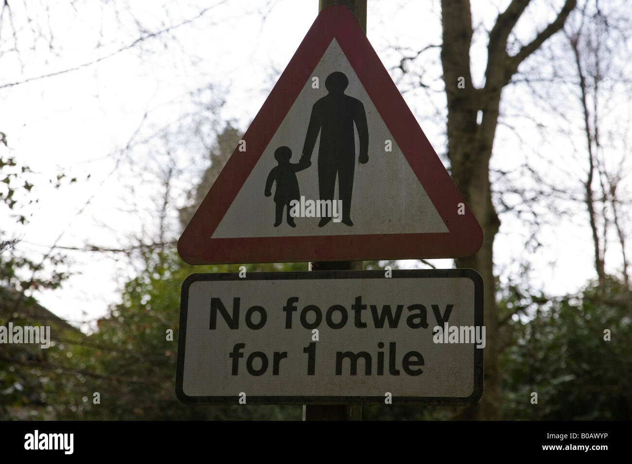 UK road sign: Pedestrians in the road, no footpath, Surrey, England ...