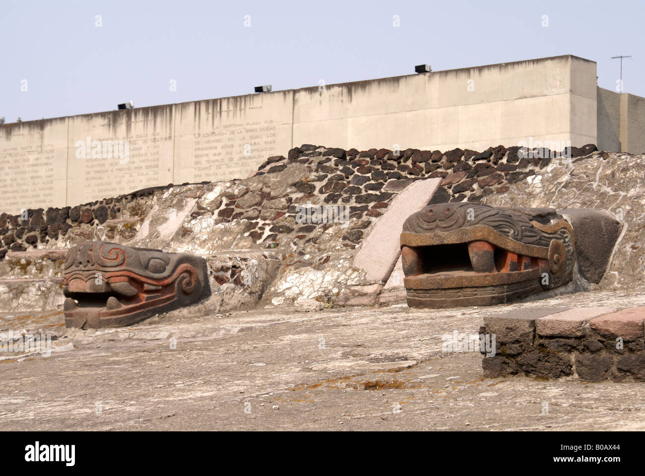 Serpent head sculptures with original colouring at Aztec ruins of the ...