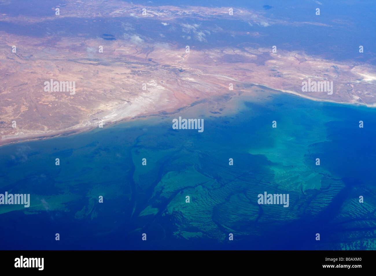 Aerial view at 40000 feet of green plankton/algae in the Indian ocean ...