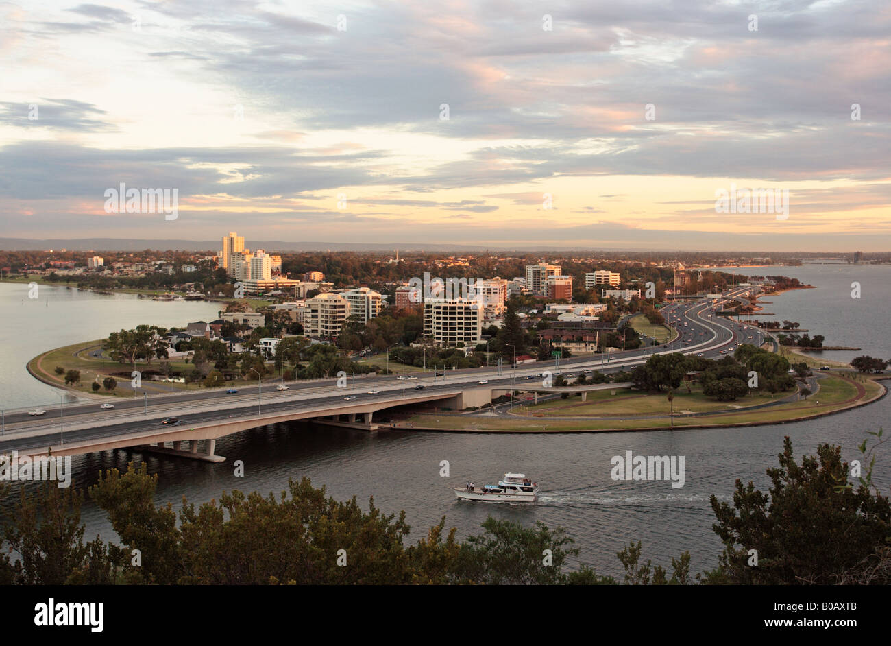 Setting sun lighting up the upper floors of high rise buildings in ...
