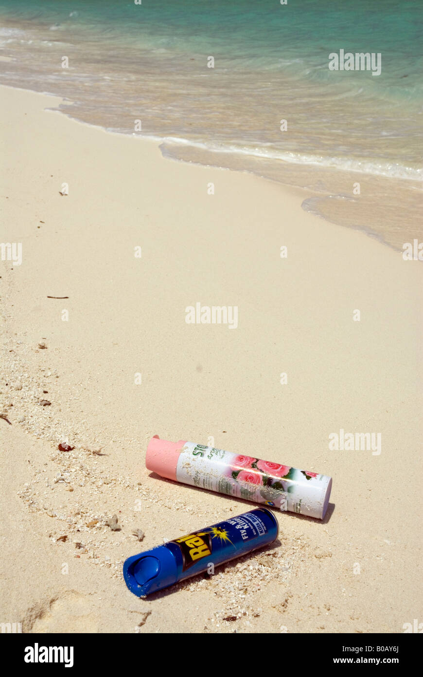Aerosol cans marine rubbish garbage washed up on beach Maldives Stock ...