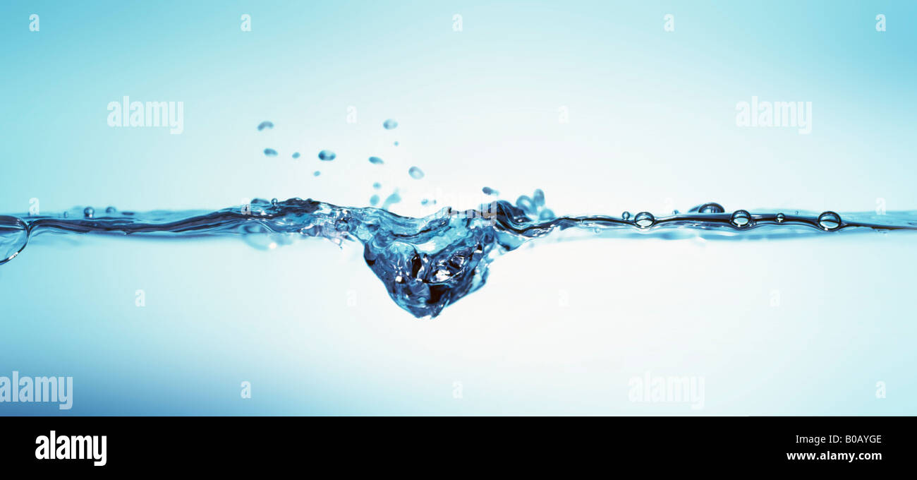close-up water level with drop and bubbles Stock Photo - Alamy