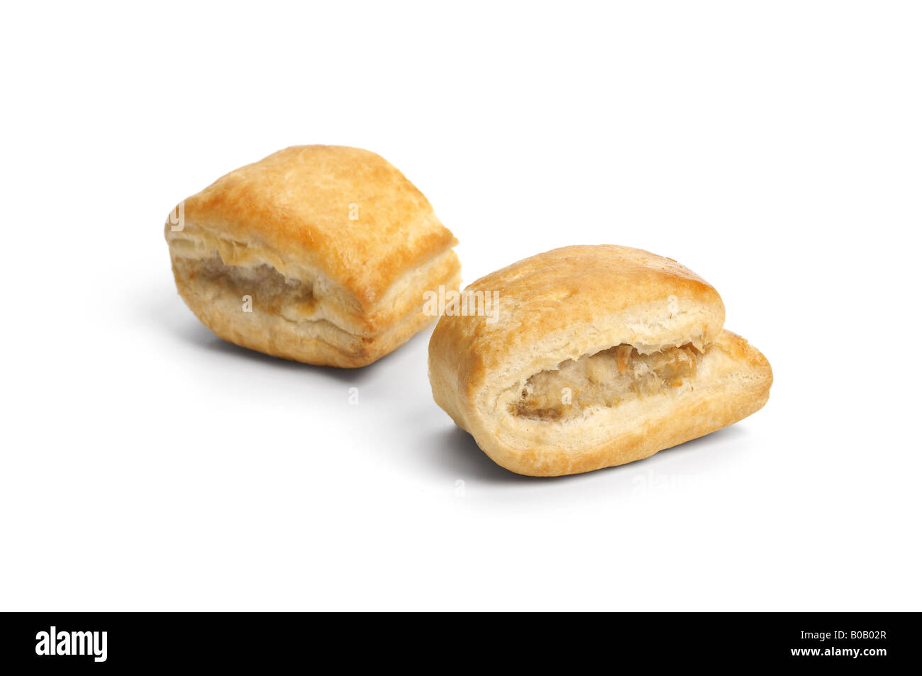 Small sausage rolls Cut Out Stock Images & Pictures - Alamy