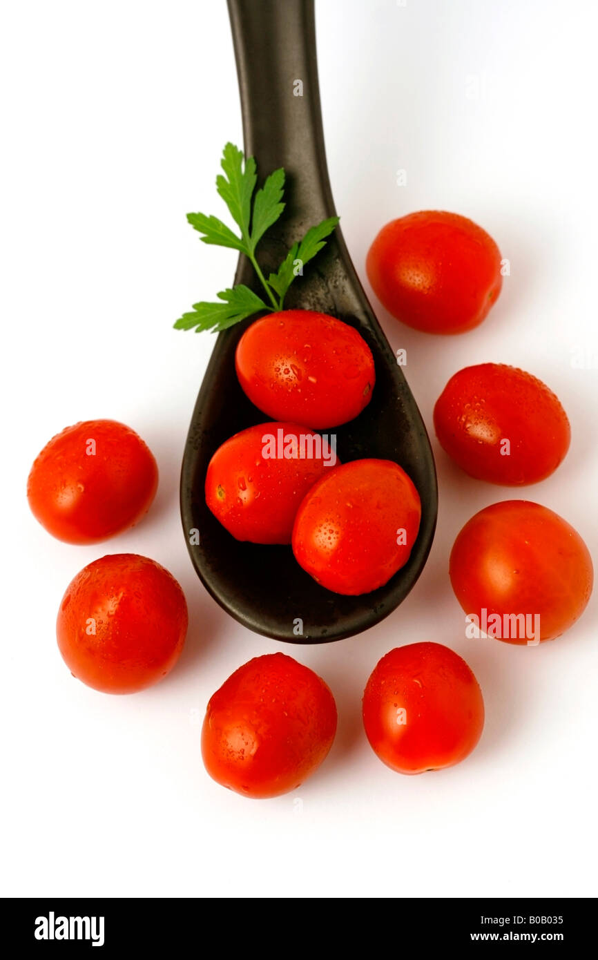 Small red tomatoes in Cut Out Stock Images & Pictures - Alamy