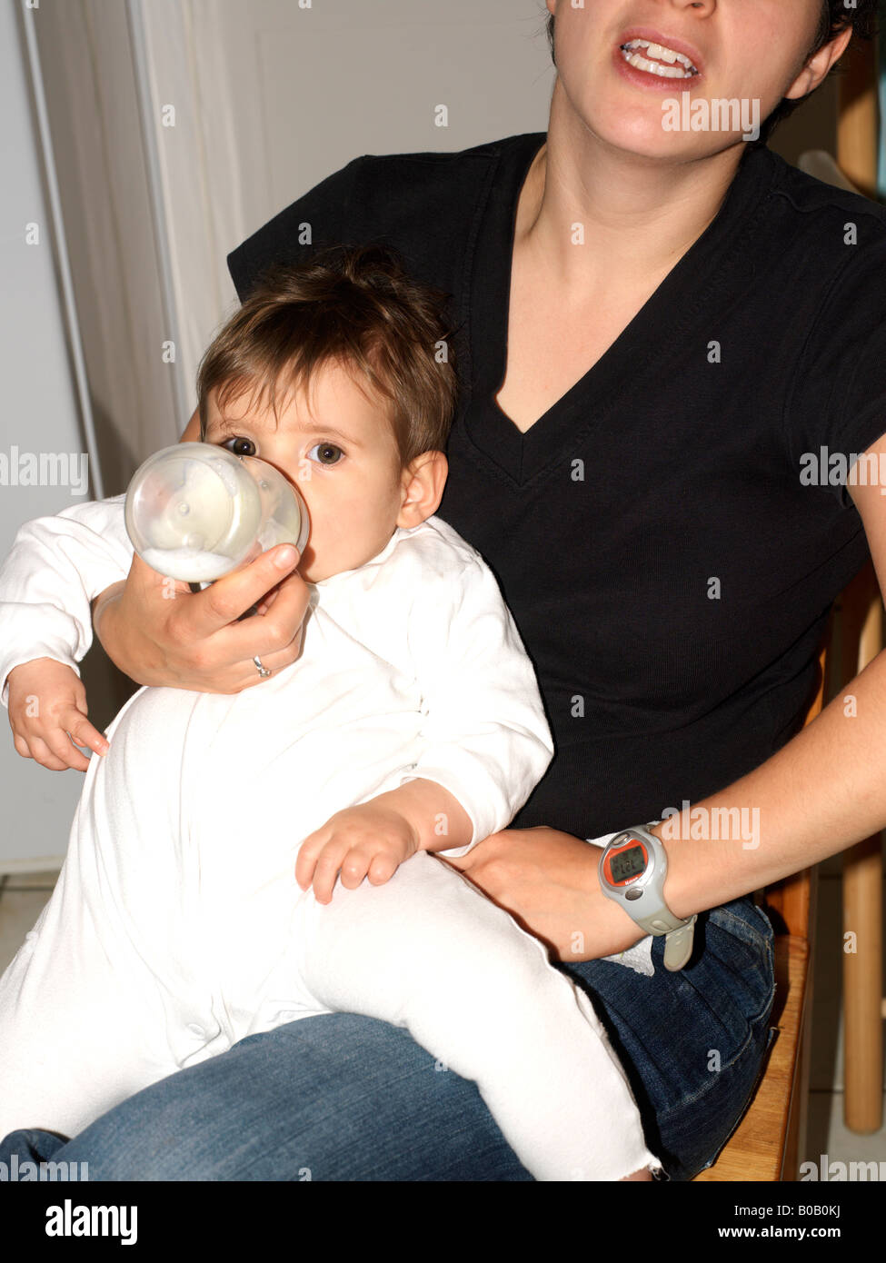 Giving baby milk hi-res stock photography and images - Alamy