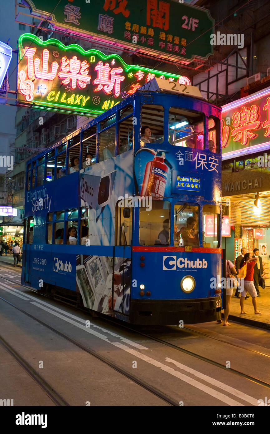 China, Hong Kong, Hong Kong Island, Wan Chai, brightly coloured trams ...