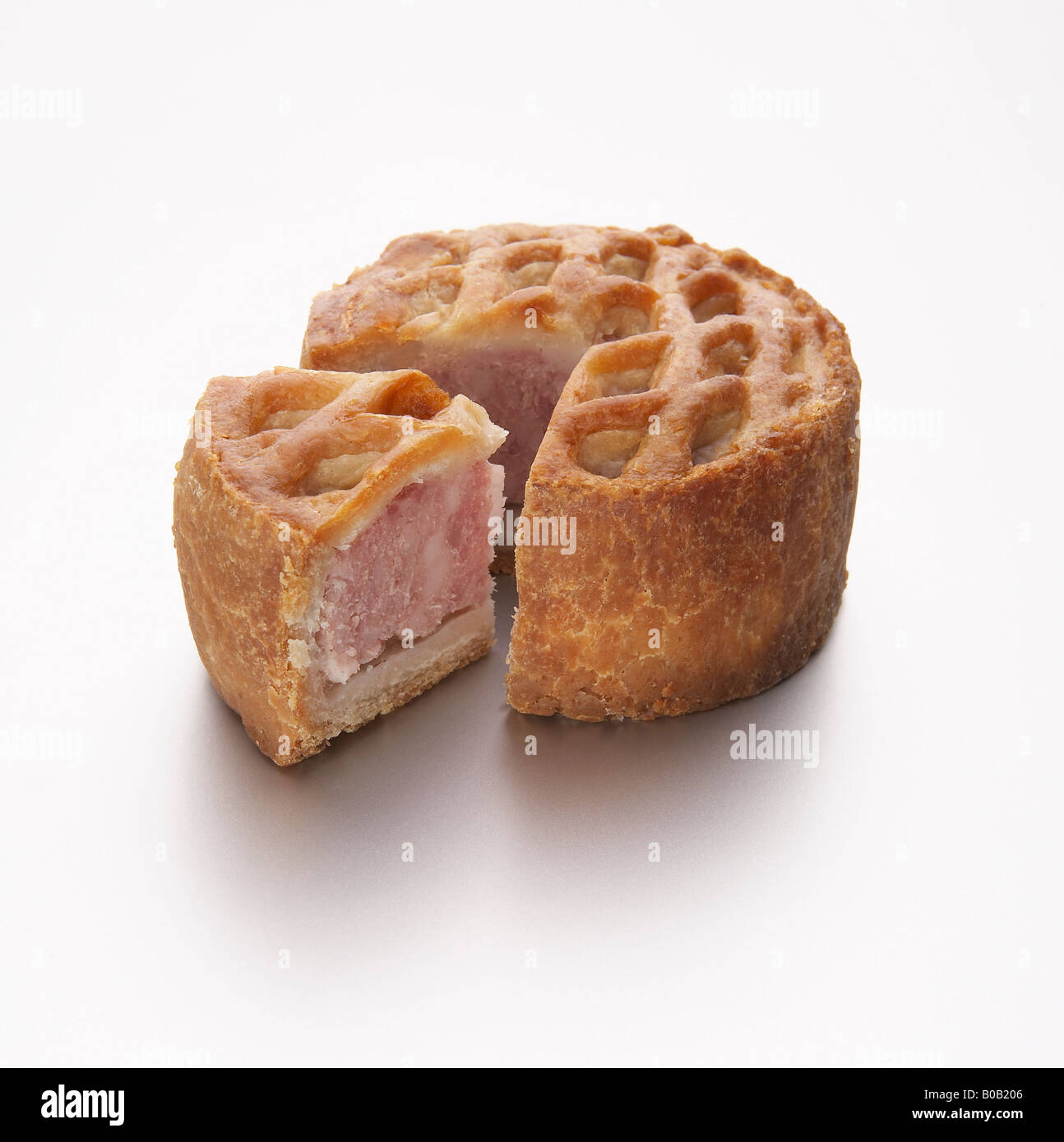 pork pie with lattice pastry top, with one slice cut Stock Photo - Alamy