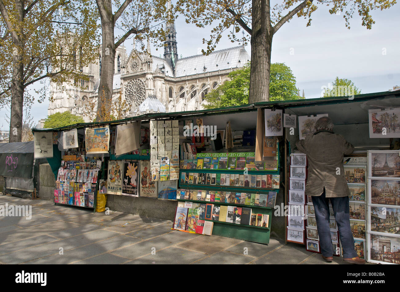 Bouquinistes or book stalls along the River Seine in Paris near Notre ...