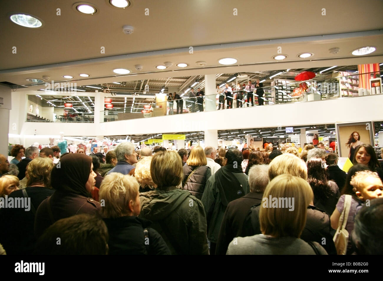 Crowds during the opening of a new supermarket South London Stock Photo ...