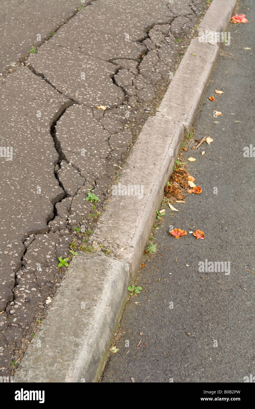 A ^cracked pavement, UK Stock Photo - Alamy