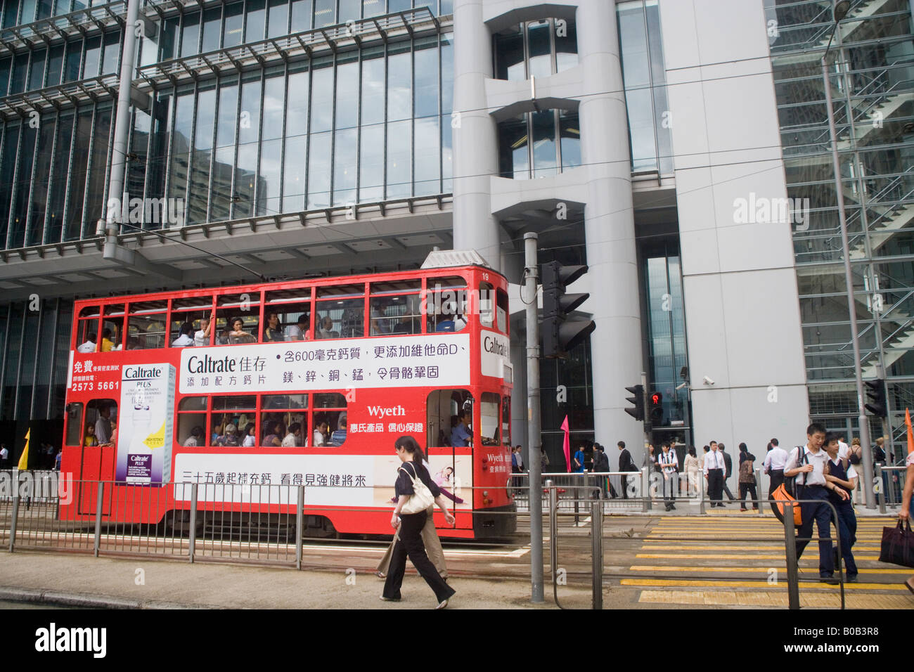 Red double decker bus outside the HSBC Bank Hong Kong Stock Photo - Alamy