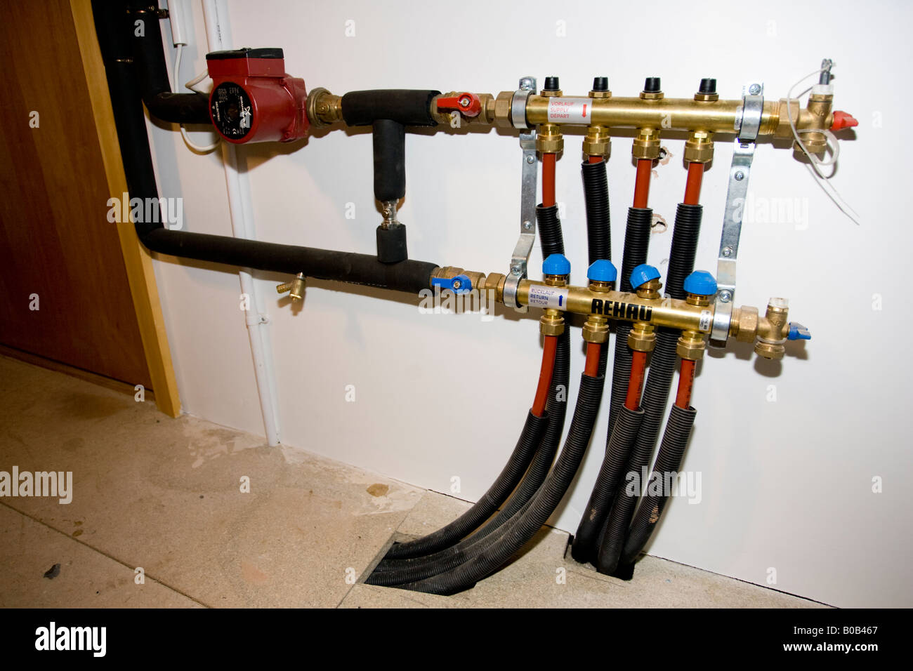 Input pipes from ground source heat pump system village hall Rock ...
