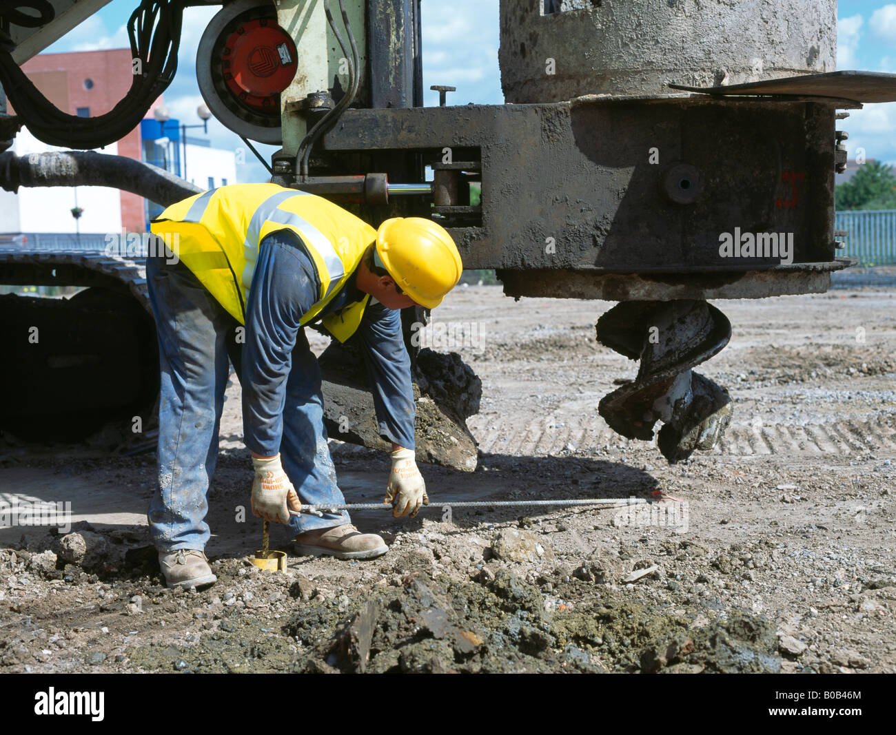 construction worker preparing piling drill Stock Photo - Alamy