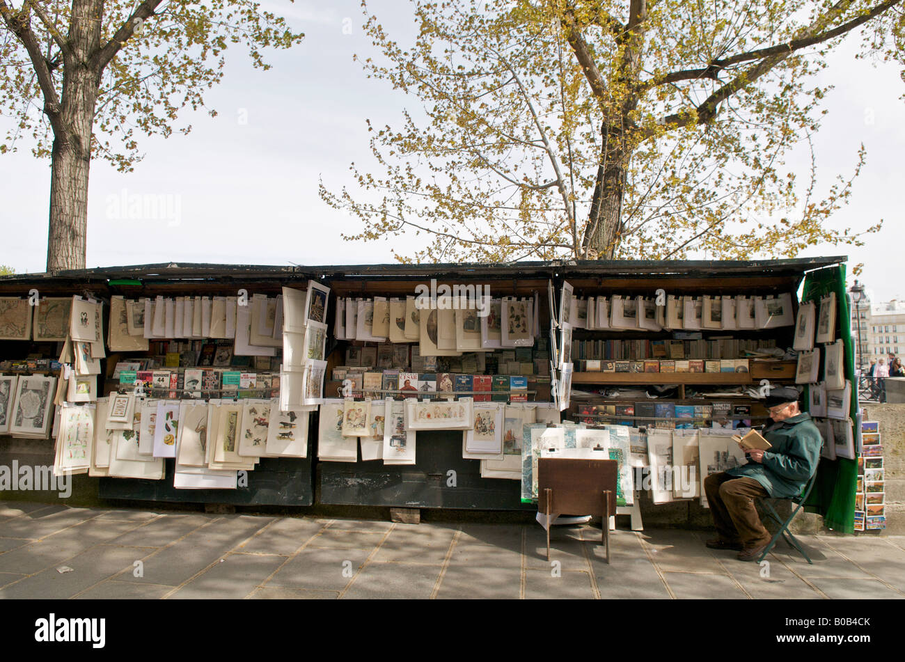 Bouquinistes or book stalls along the River Seine in Paris near Notre ...