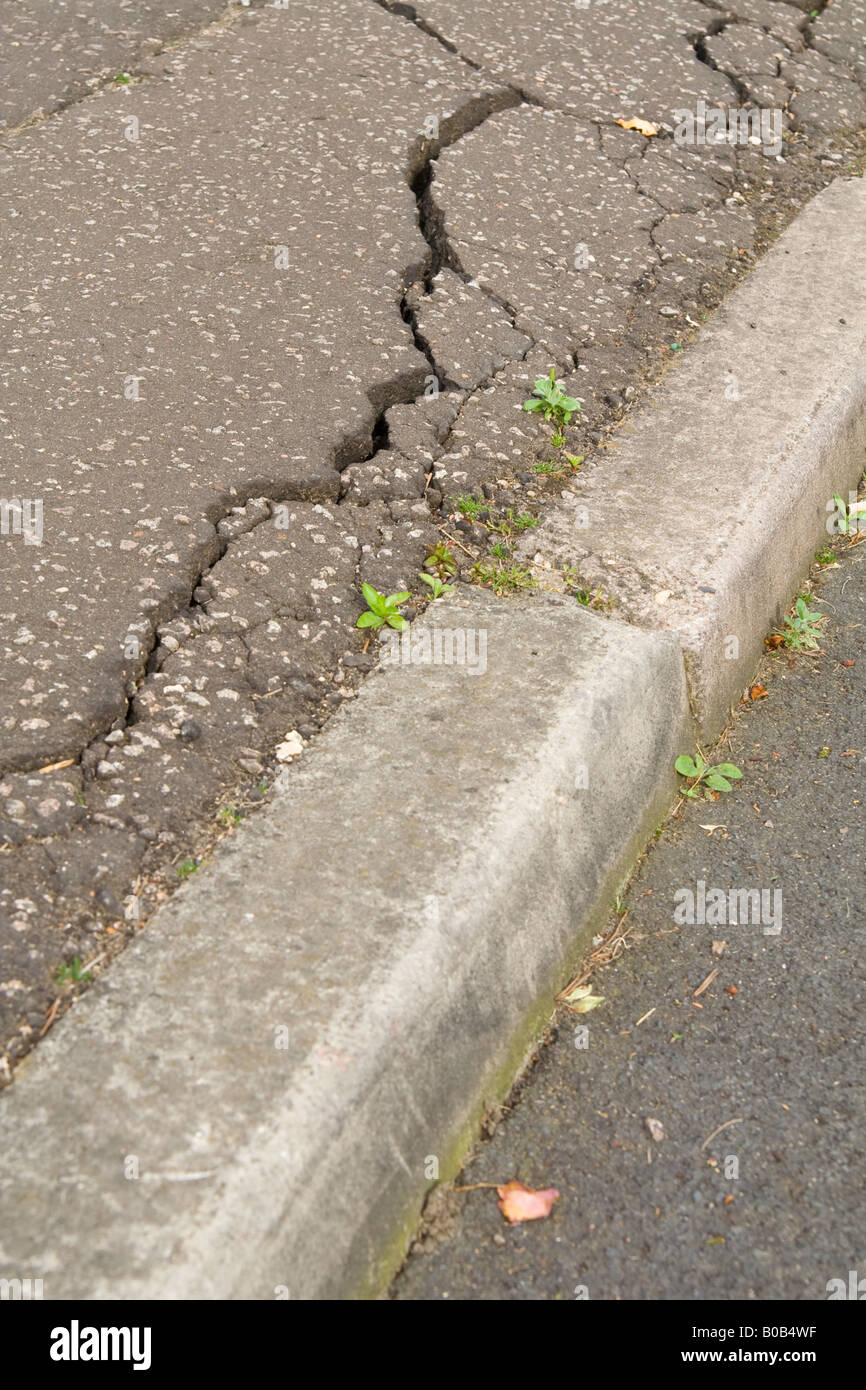 A ^cracked pavement, UK Stock Photo - Alamy