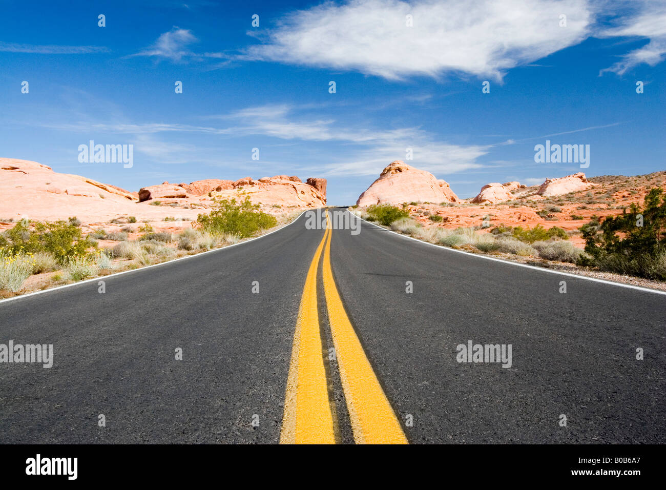 USA - Nevada. Looking down road running through Valley of Fire State ...