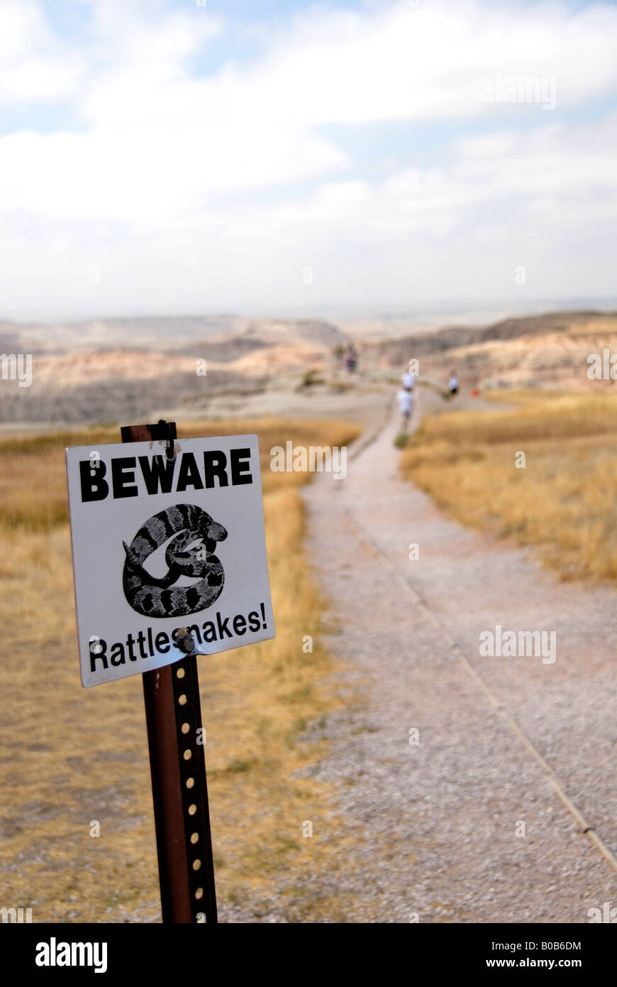 North America, USA, South Dakota, Badlands National Park. Warning sign ...