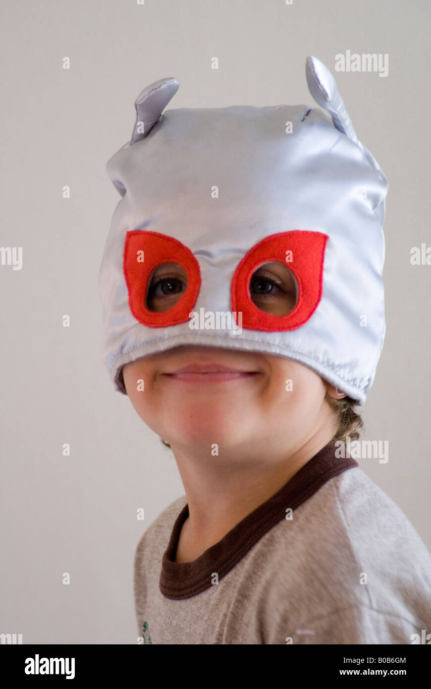 Boy in an alien mask Stock Photo - Alamy