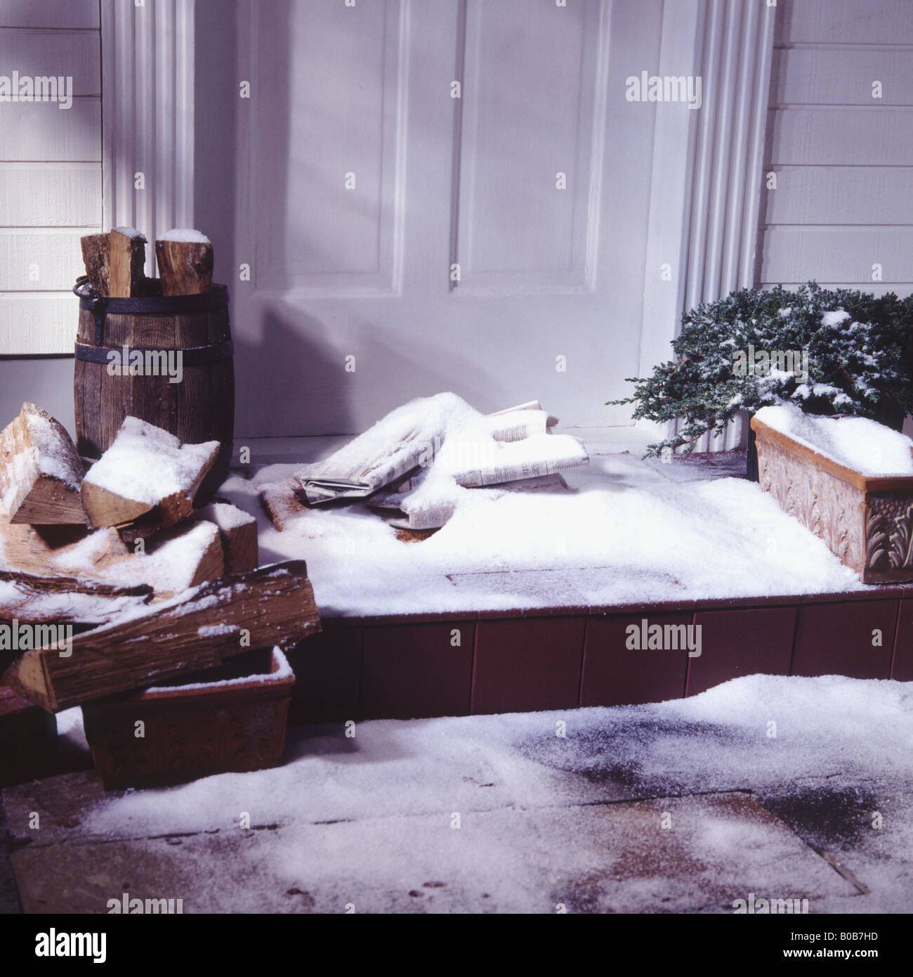 newspaper delivery on winter porch Stock Photo - Alamy