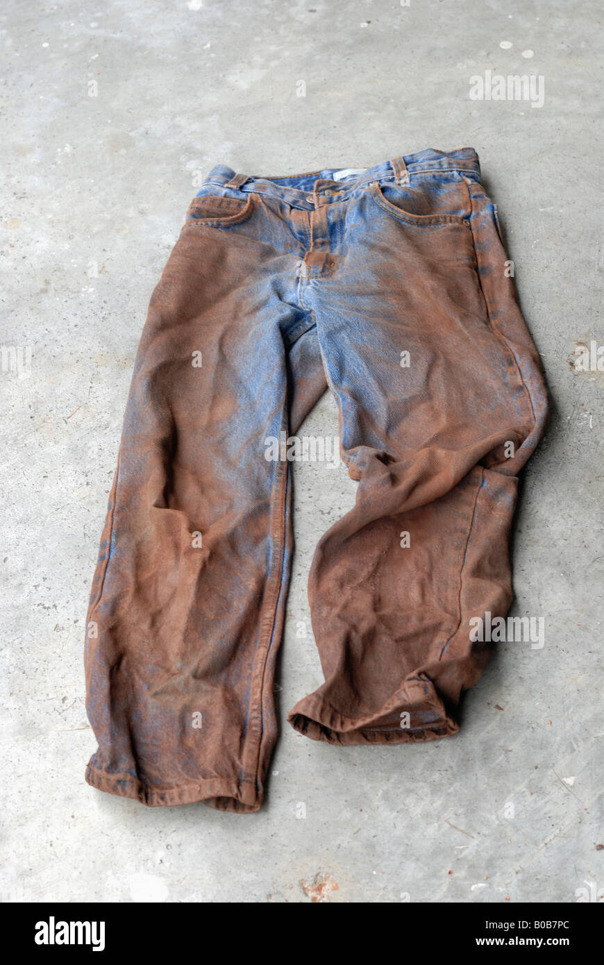 Boys dirty blue jeans Stock Photo - Alamy