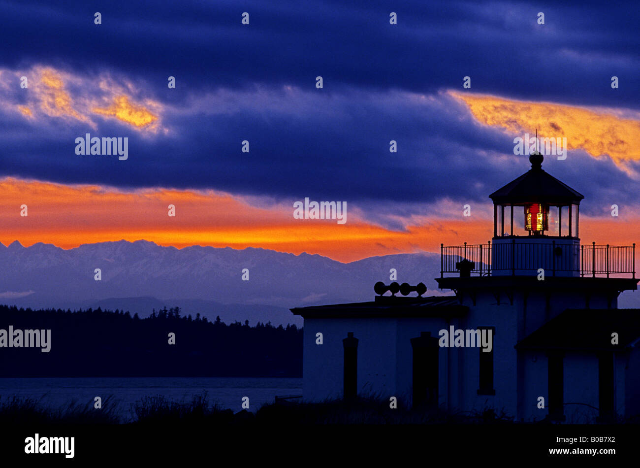 Lighthouse at western end of Discovery Park with Puget Sound in ...