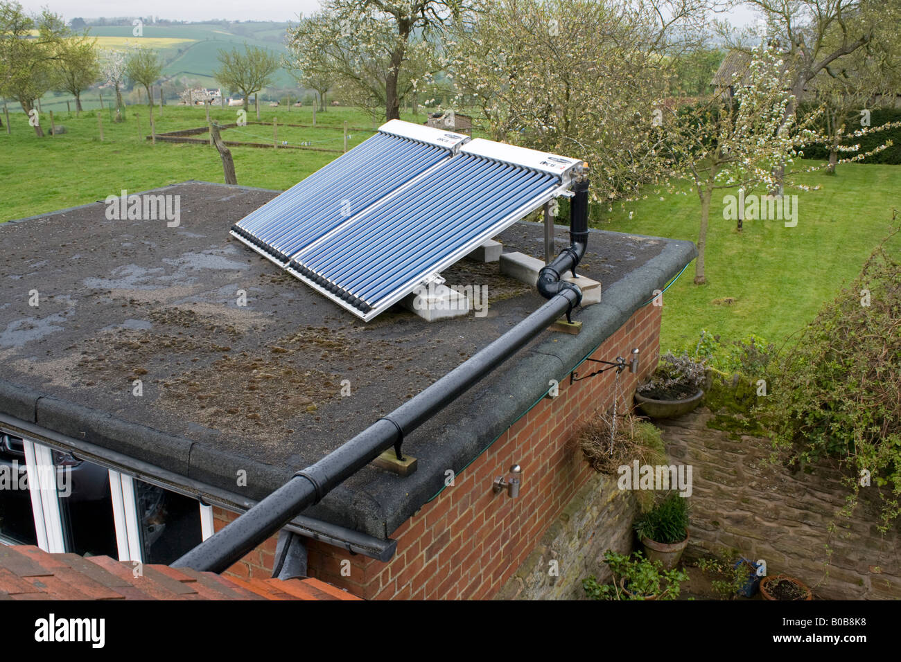 Solar thermal installation Bauer OPC 15 evacuated tubes on roof Bewdley ...