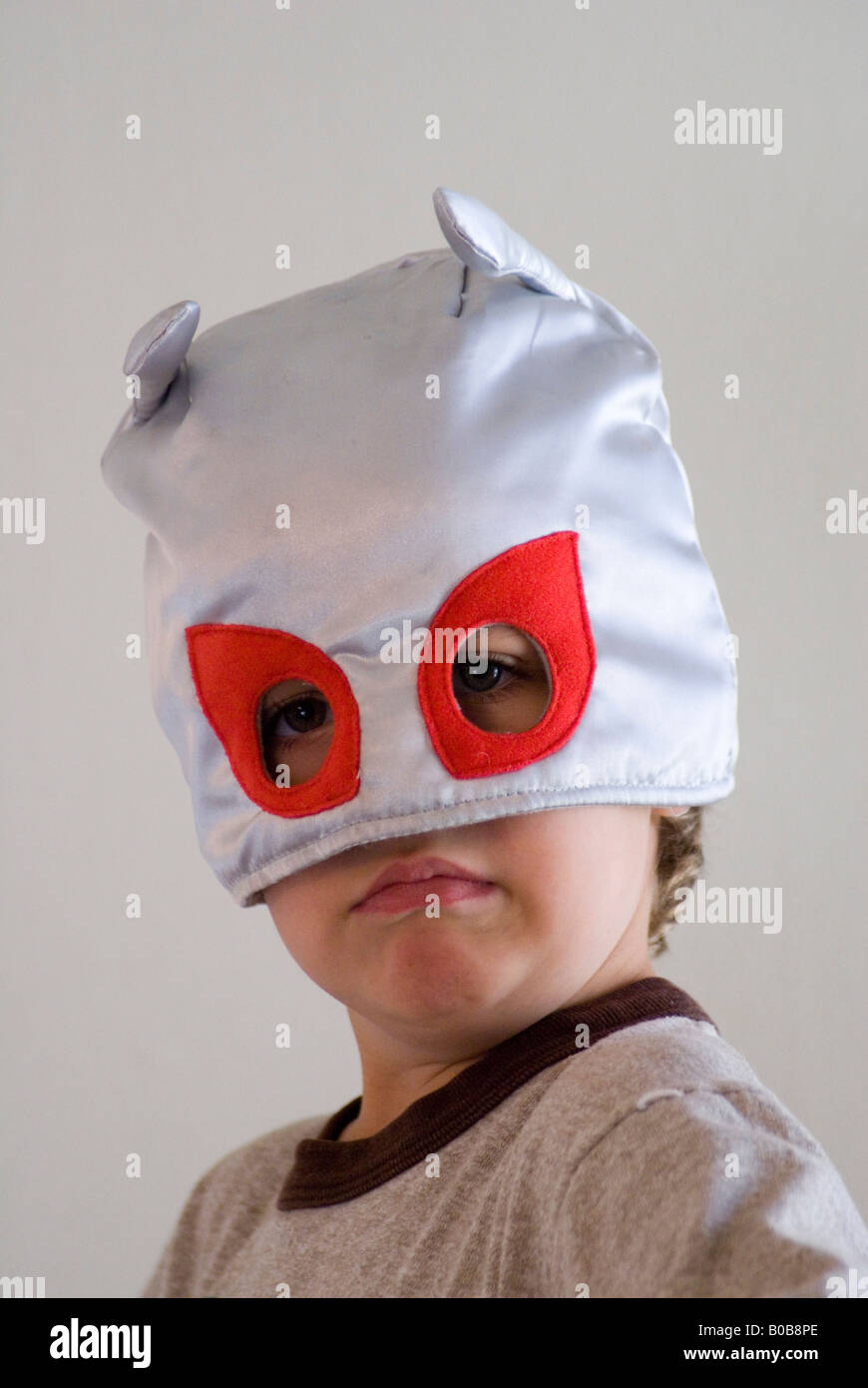 Boy in an alien mask cutout Stock Photo - Alamy