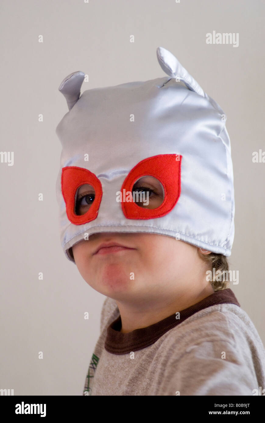 Boy in an alien mask Stock Photo - Alamy