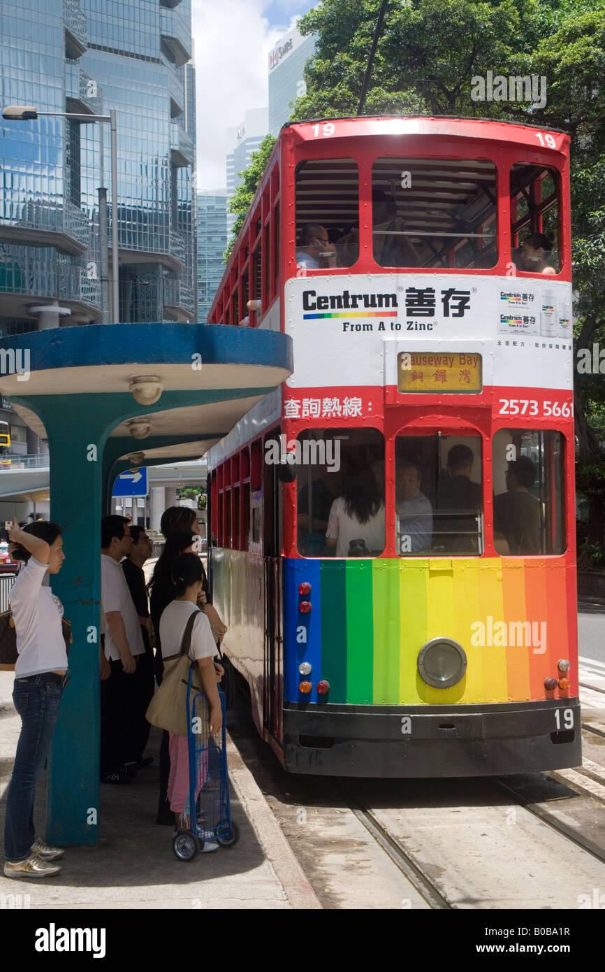 Brightly coloured tram Hong Kong Stock Photo - Alamy