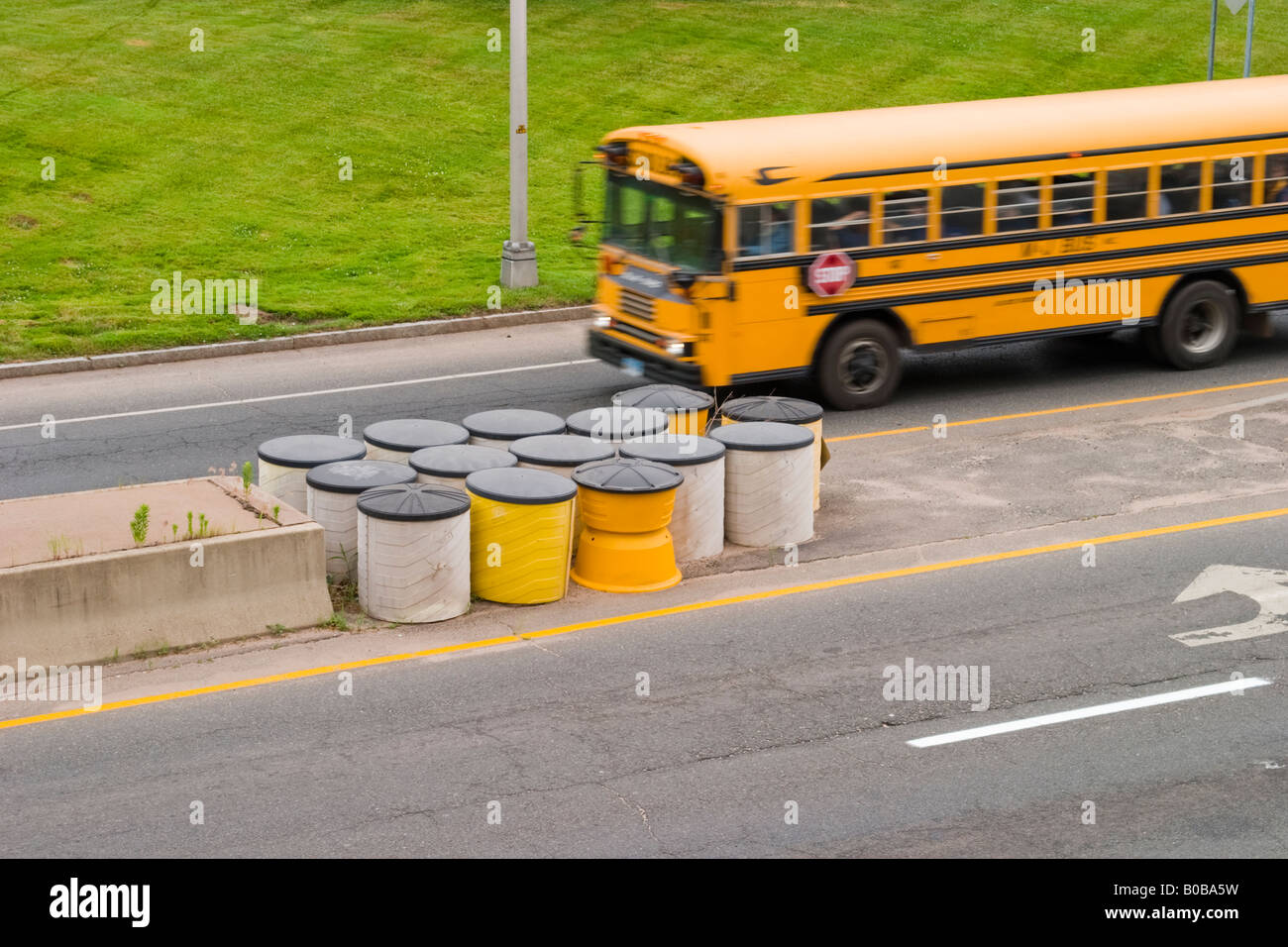 Containers of sand on a city street to help prevent automobiles from ...