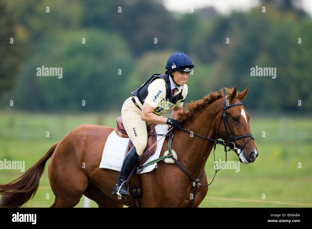 Rider Pippa Funnell in the cross country phase of an eventing ...