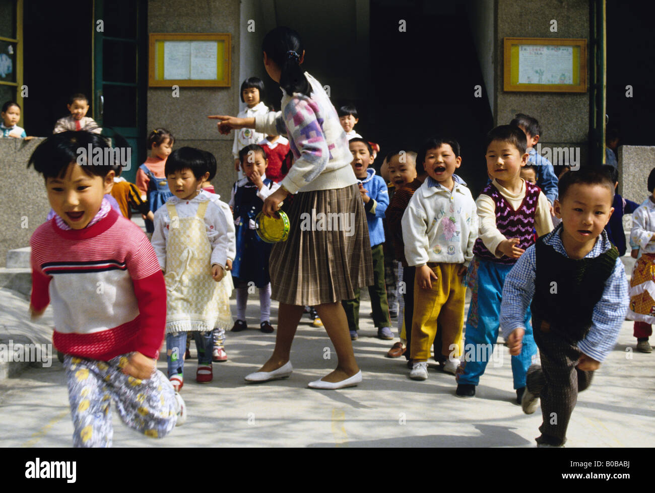 School kids running recess hi-res stock photography and images - Alamy