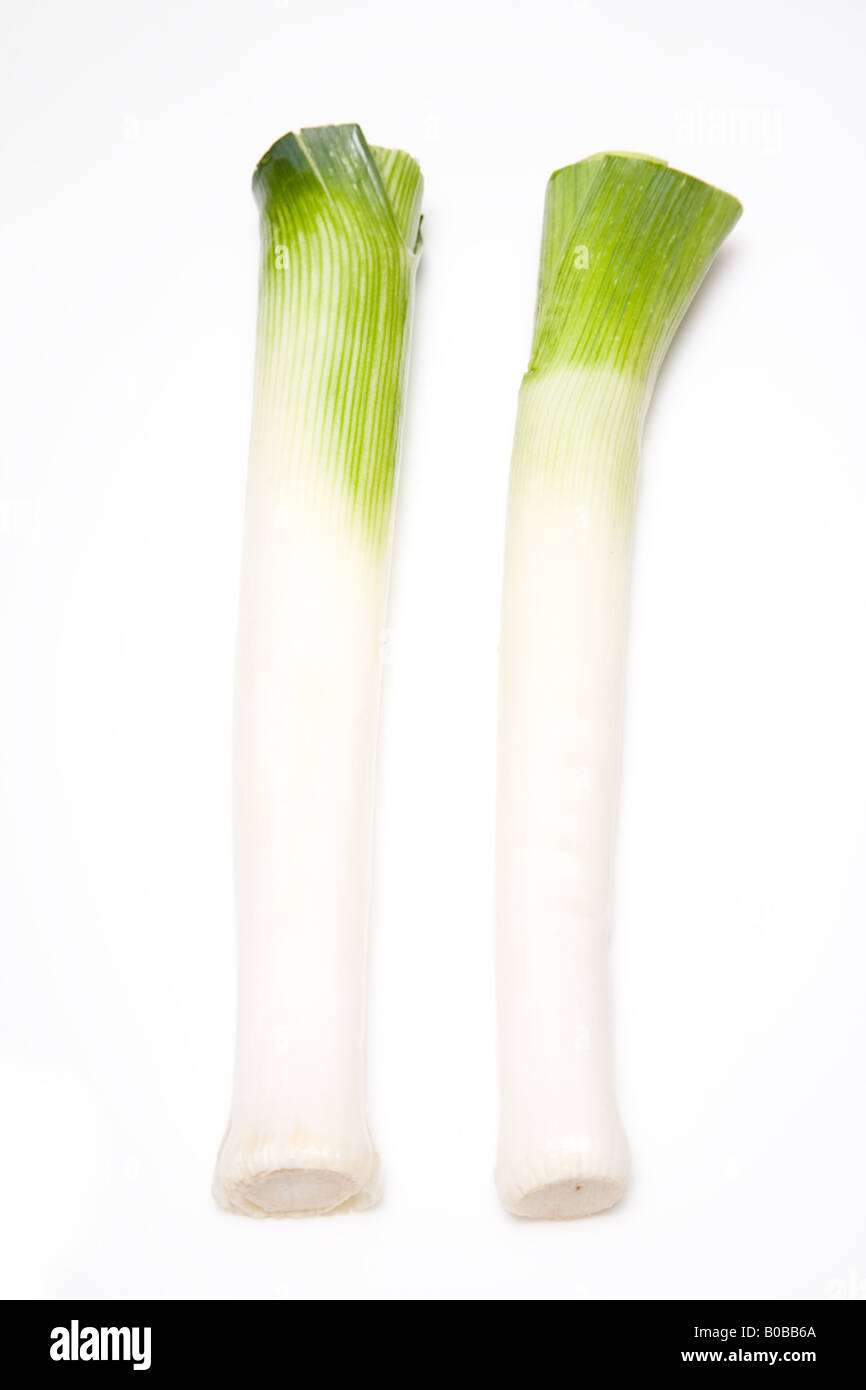 Leeks isolated on a white studio background Stock Photo - Alamy