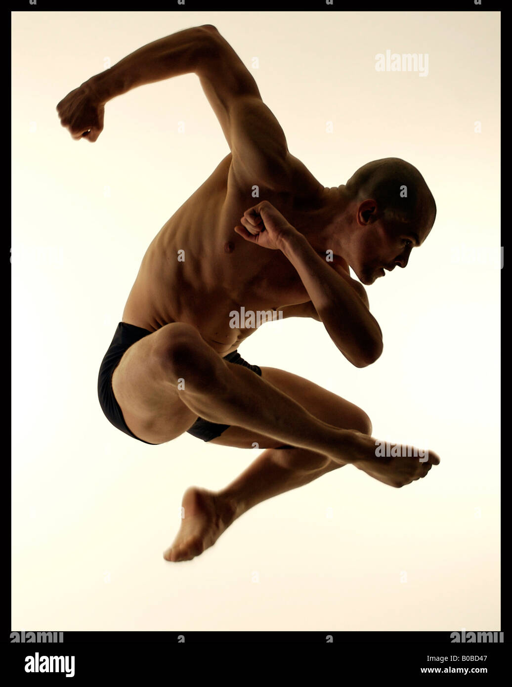 Male dancer leaping Stock Photo - Alamy