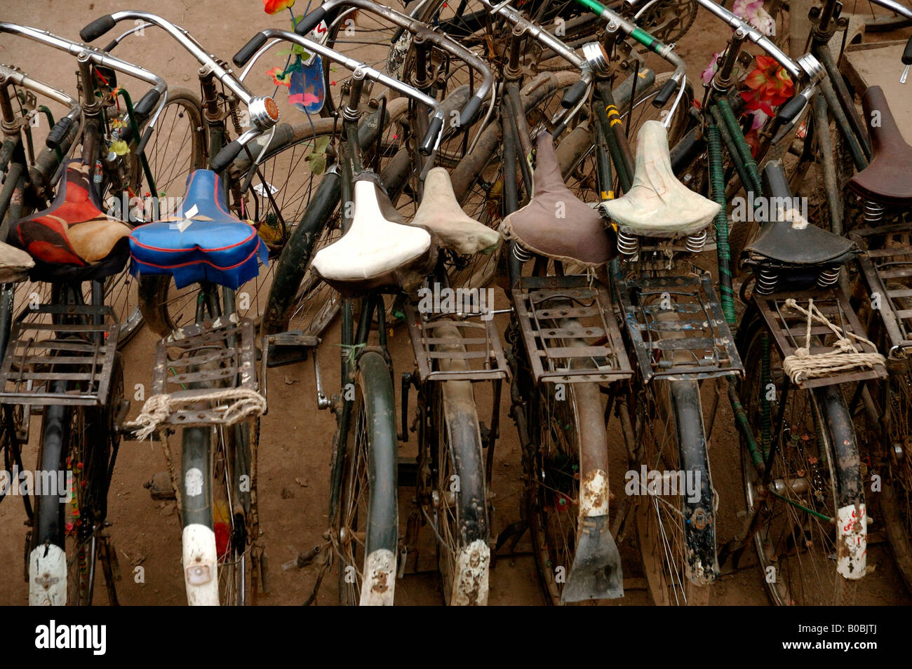 Old bicycles view from above. Saddles Stock Photo - Alamy