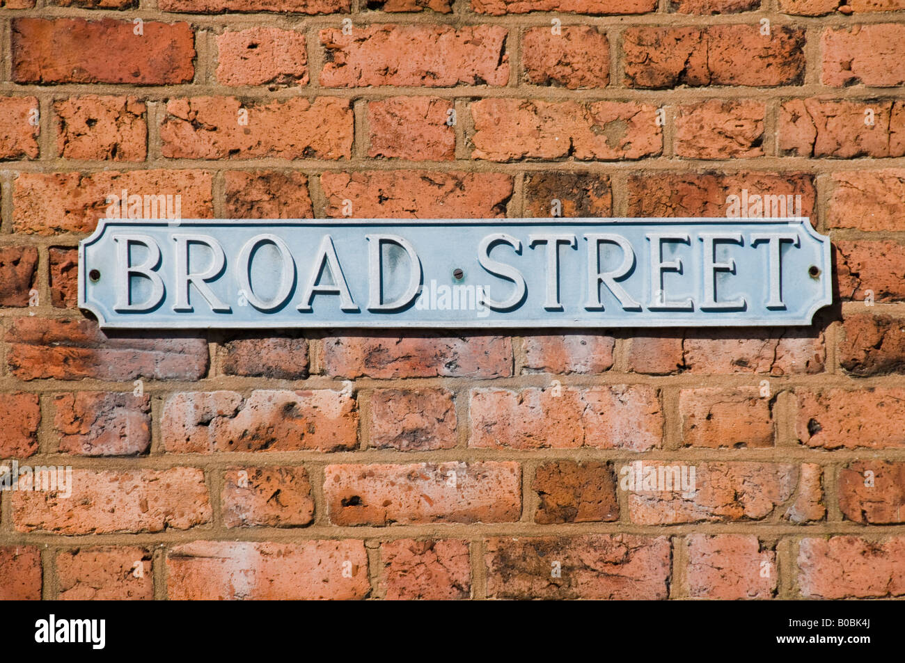 Street Sign for BROAD STREET on a brick wall in the town of Montgomery ...