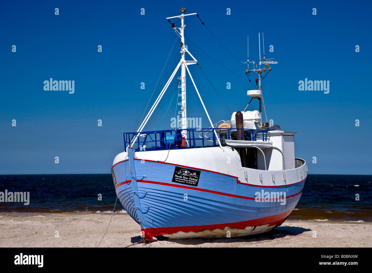 Fishing cutter on the beach Stock Photo - Alamy