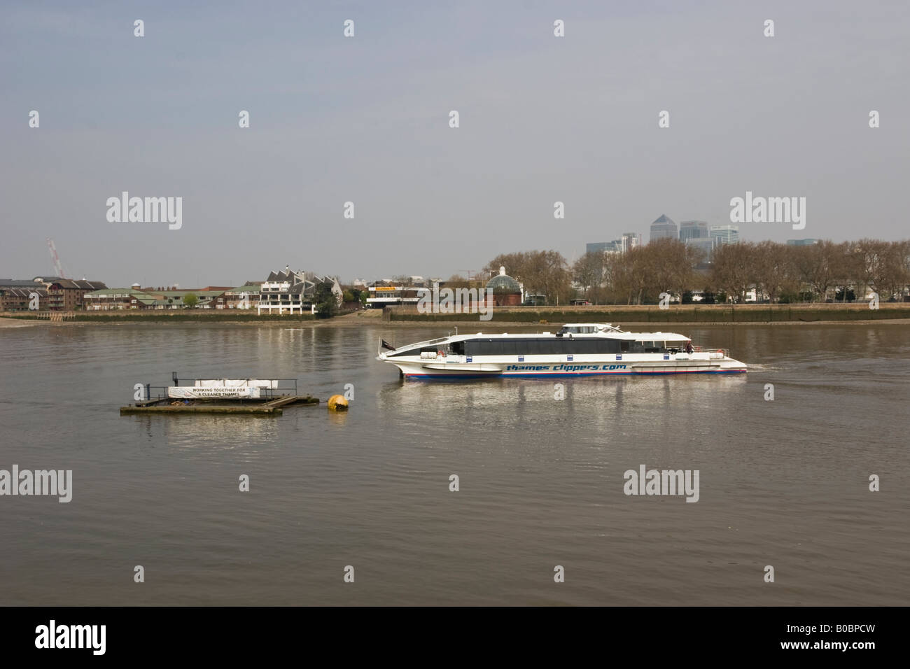 A Waterbus from the new Thames service makes its way up river past ...