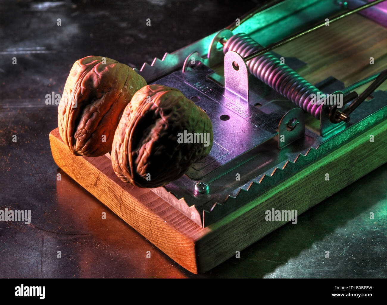 Rat trap ready to crush nuts Stock Photo - Alamy
