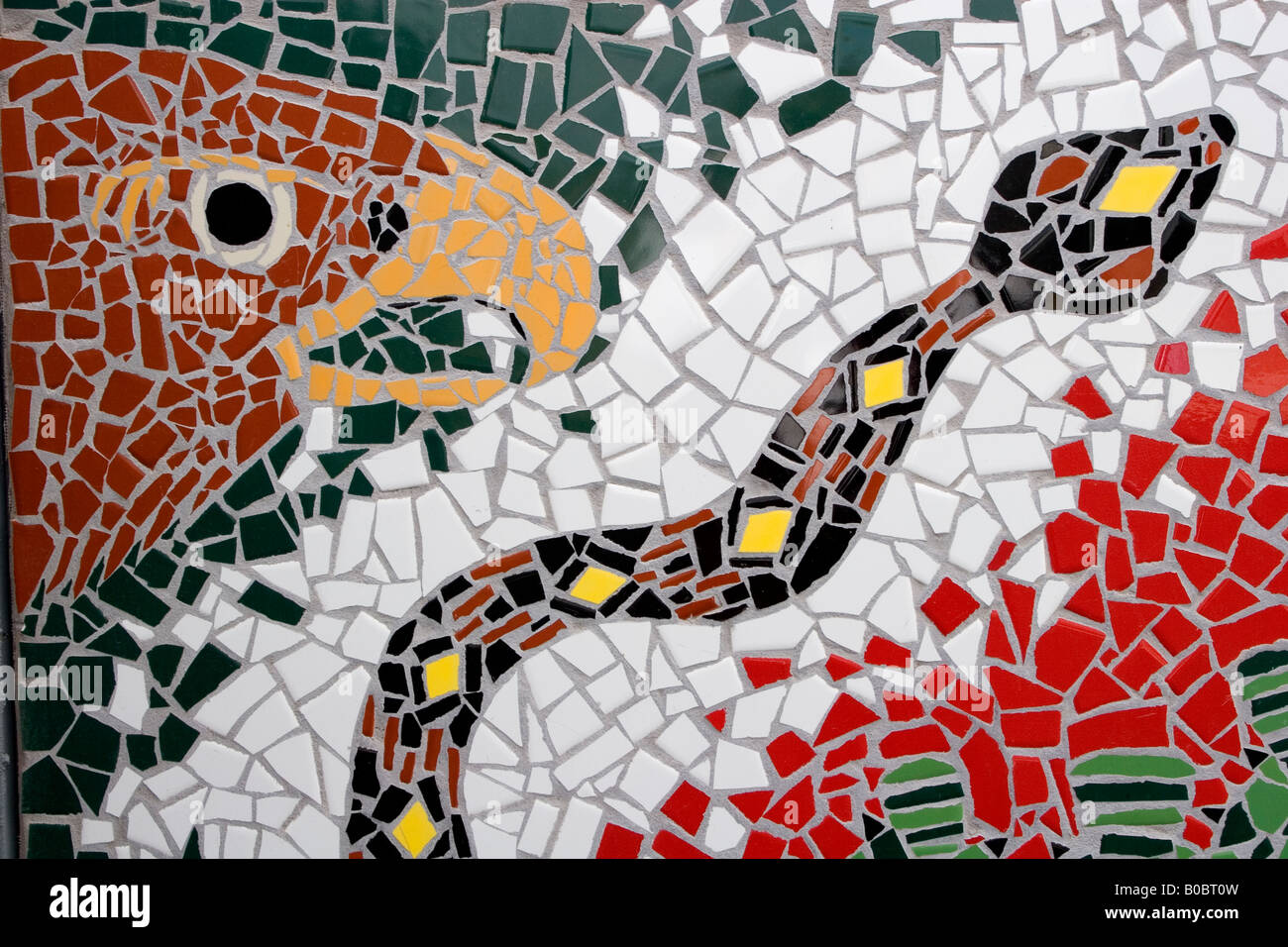 Mosaic tile snake and hawk on wall in Tucson Arizona Stock Photo - Alamy